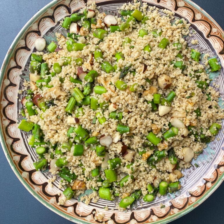Couscous with crunchy nuts, asparagus, and mint